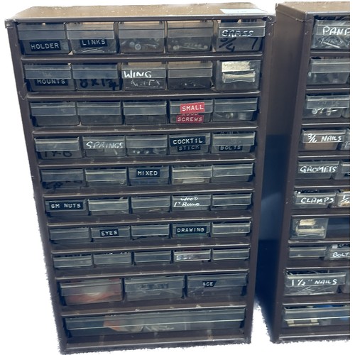 Three raaco fixing boxes and contents