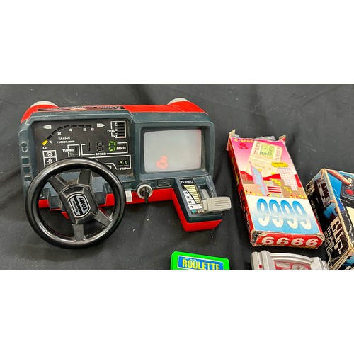 Selection of vintage games to include a Tomy Pali toy ' blip console ...