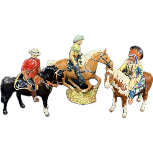 Three vintage Beswick mounted figures to include an Indian, Cowboy and ...