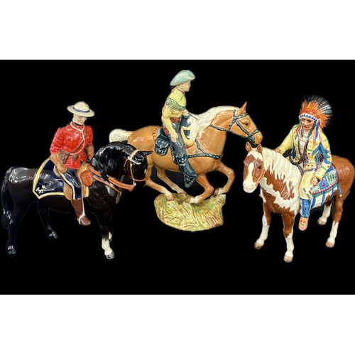 Three vintage Beswick mounted figures to include an Indian, Cowboy and ...