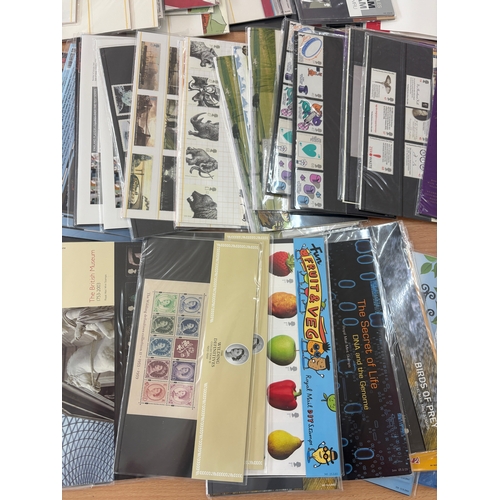 Large selection of sealed stamp presentation packs