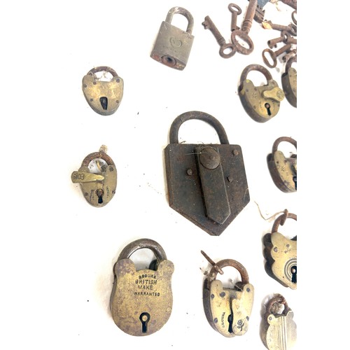 Selection of antique and vintage locks, some with keys
