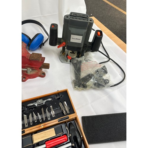 Selection of tools to include a power master router, vice, ear ...