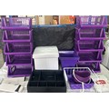 Selection of purple storage racks, bins etc
