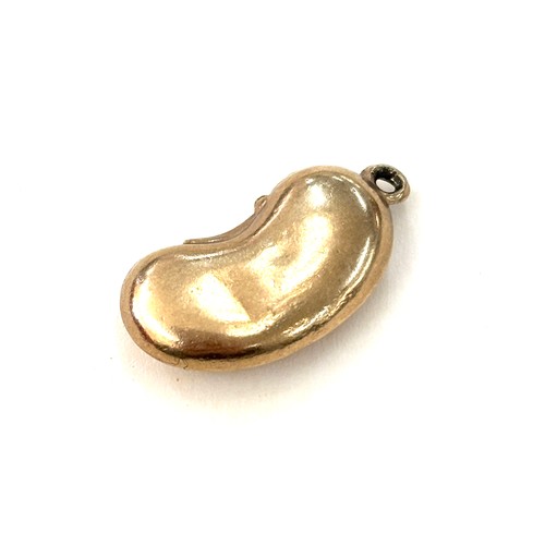 9ct gold kidney bead charm total weight 0.8 grams