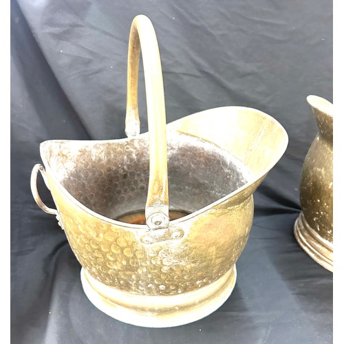 Two brass helmet coal scuttles