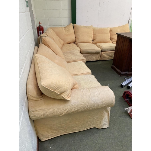 Large L shaped sofa , yellow loose cushions, (white draylon base ...