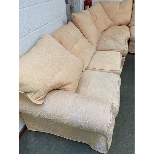 Large L shaped sofa , yellow loose cushions, (white draylon base ...