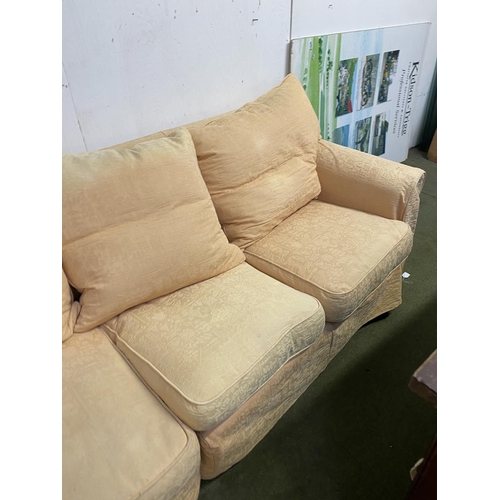Large L shaped sofa , yellow loose cushions, (white draylon base ...