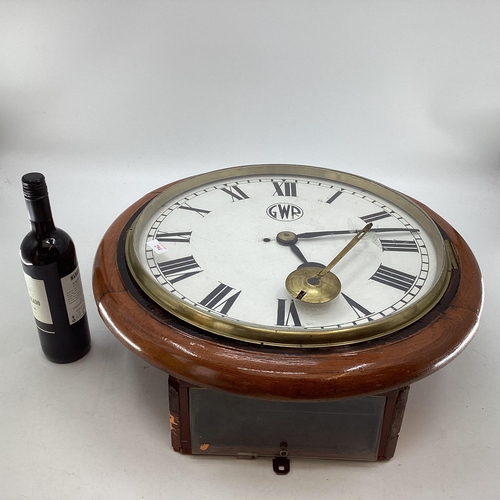 A large GWR circular station wall clock 57cm dia