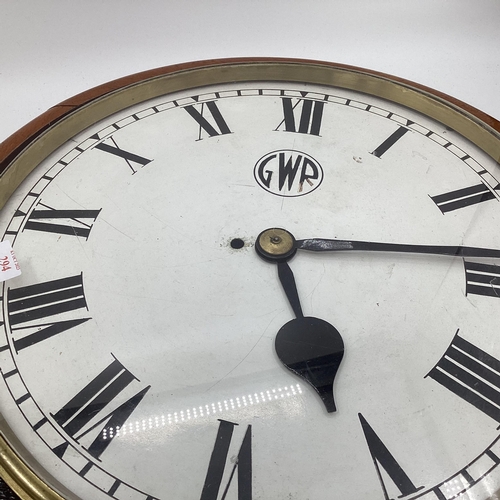 A large GWR circular station wall clock 57cm dia