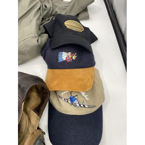 A leather flying hat complete with goggles, and a quantity of FLYING ...