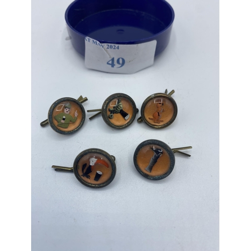 A set of five collectable Guinness reverse glass painted buttons.