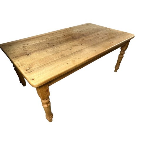 A pine kitchen table, 182 x 104 x 78 high, cm