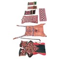 A collection of South Asian textiles to include embroided items and a ...