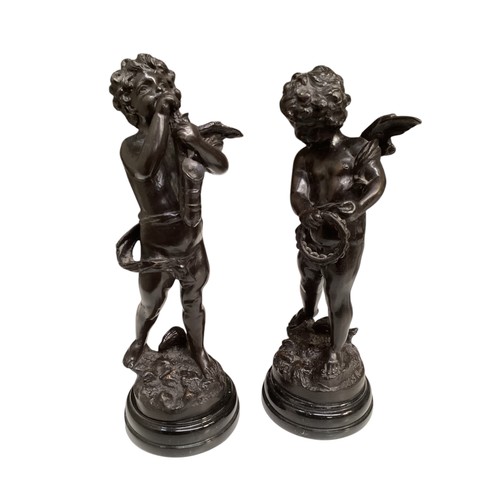 After L F Moreau pair of patinated bronze Putti, with cast signature on ...