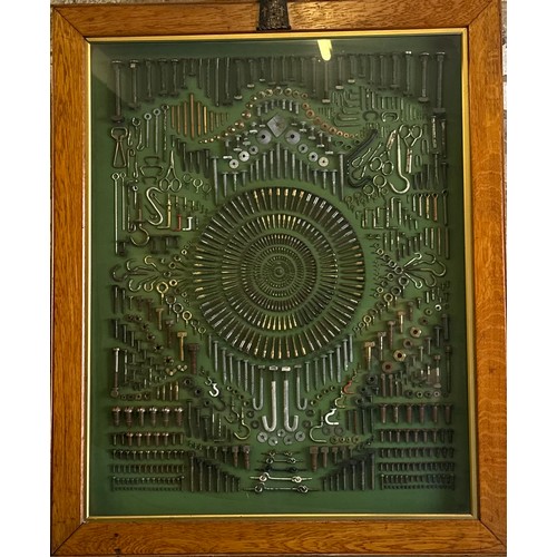 Large hanging display case containing a collection of automobilia parts ...