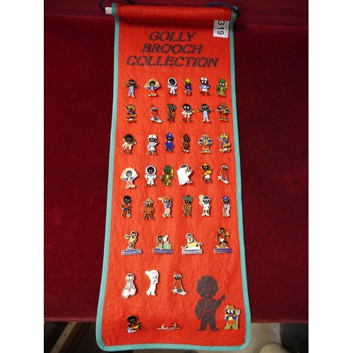 GOLLY BROOCH COLLECTION ON HANGER