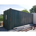 SHIPPING CONTAINER WITH OPENING FOR PEDESTRIAN DOOR