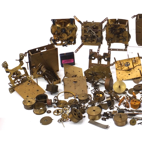 Collection of vintage clock movements, parts and accessories including ...