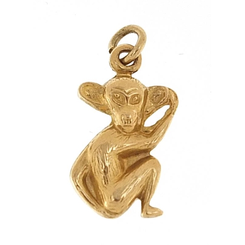 Unmarked 9ct gold monkey charm, 1.9cm high, 1.2g