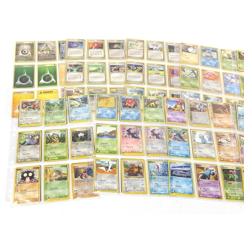 Pokemon trade cards arranged in sleeves including some original base ...