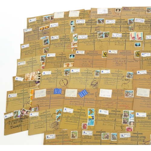 Collection of Zimbabwe registered letter envelopes with postal stamps