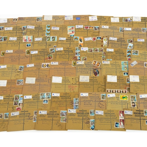 Collection of Zimbabwe registered letter envelopes with postal stamps