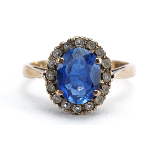 9ct gold blue stone and clear stone cluster ring, the blue stone tests ...