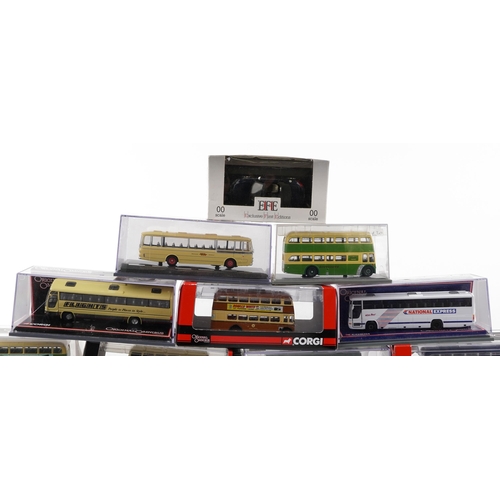 Twenty four 1:76 scale diecast buses with cases and boxes including ...