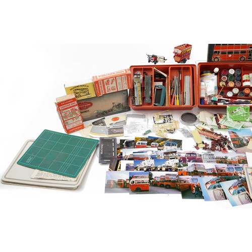 Collection of diecast model bus accessories, building materials and paints