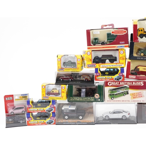 Collection of diecast model buses and vehicles with boxes and cases ...