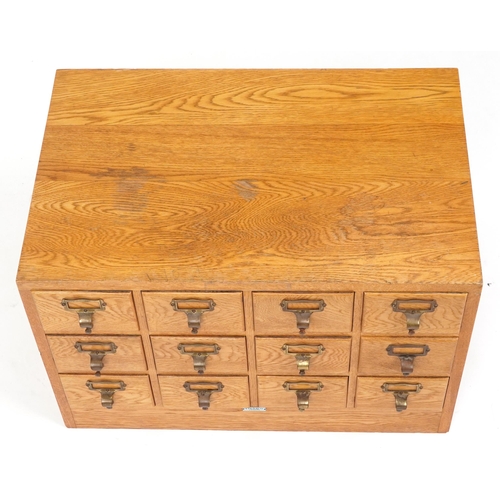 Industrial light oak slope front haberdashery twelve drawer filing ...