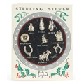 Set of nine sterling silver Christmas pudding charms on original card