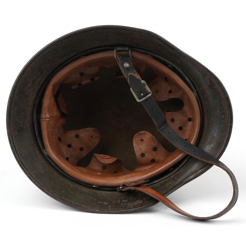 German military interest tin helmet with leather liner and chin strap ...