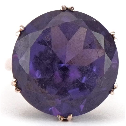 Large 9ct gold blue/purple stone ring, tests as a sapphire, the stone ...