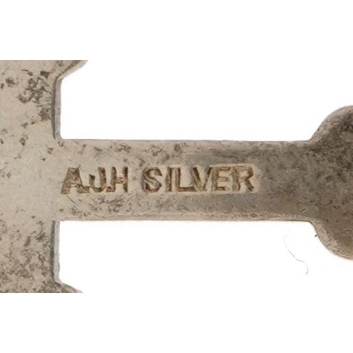 Silver engraved cross pendant on a white metal necklace, 2cm high and ...