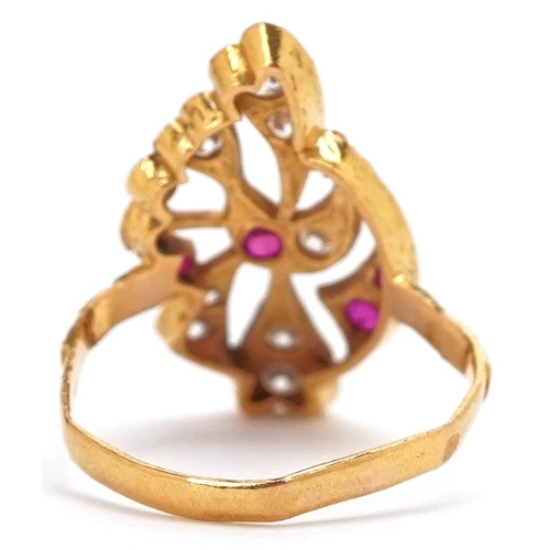 A 22ct gold ruby and clear stone cocktail ring marked 916, size M, 3.6g.