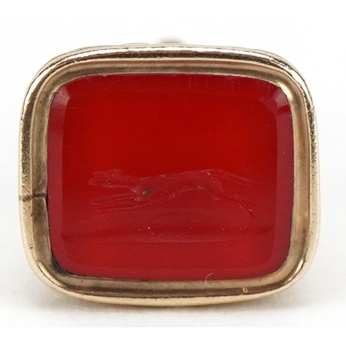 A Victorian yellow metal carnelian seal fob, the matrix engraved with a ...