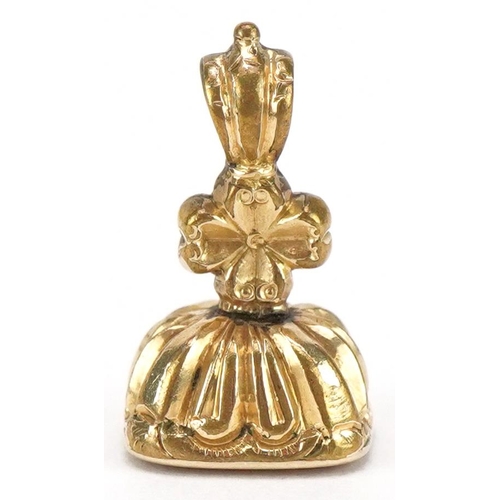 A Victorian yellow metal carnelian seal fob, the matrix engraved with a ...