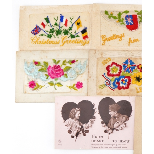 A collection of eight early 20th century embroidered postcards, the the ...