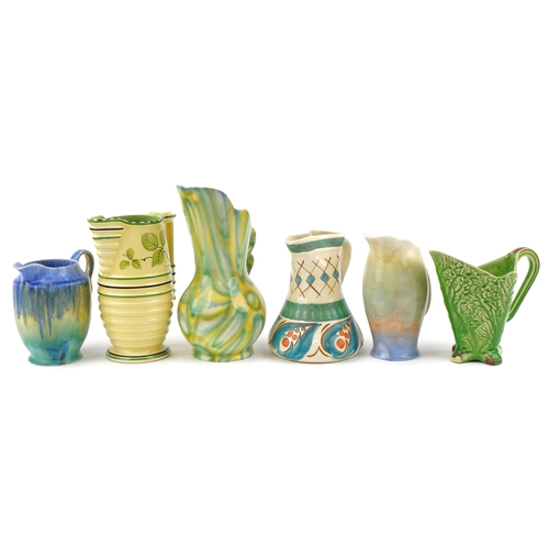 A collection of Art Deco pottery jugs including Crown Devon and ...