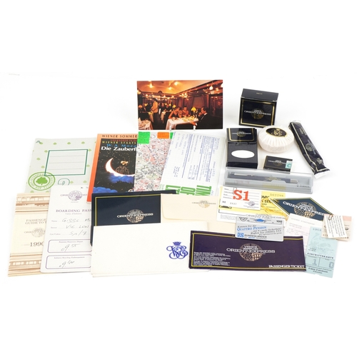 A collection of 1990s Orient Express railway memorabilia.
