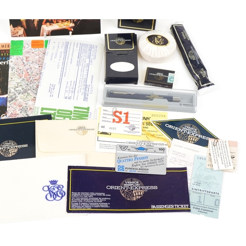 A collection of 1990s Orient Express railway memorabilia.