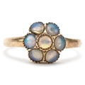 A 9ct gold opal flower head ring, size M/N, 2.1g.