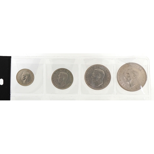 An uncirculated set of George VI 1941 silver coins comprising half ...
