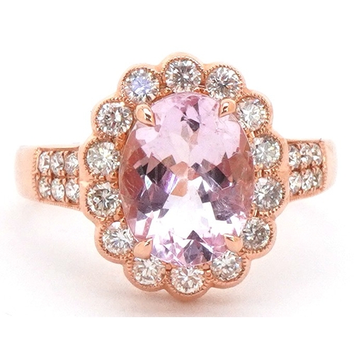 An 18ct rose gold morganite and diamond flower head ring with diamond ...