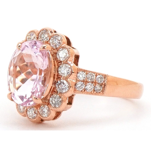An 18ct rose gold morganite and diamond flower head ring with diamond ...