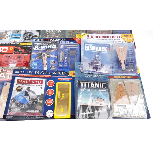 A collection of collectable magazines, predominantly model kits.