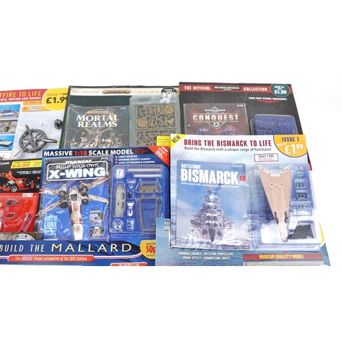 A collection of collectable magazines, predominantly model kits.